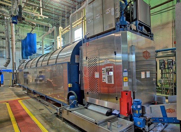 High-Efficiency Milnor Tunnel Washers | MEGA Laundry