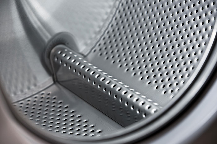 High Spin Vs Medium Spin Industrial Washers Explained